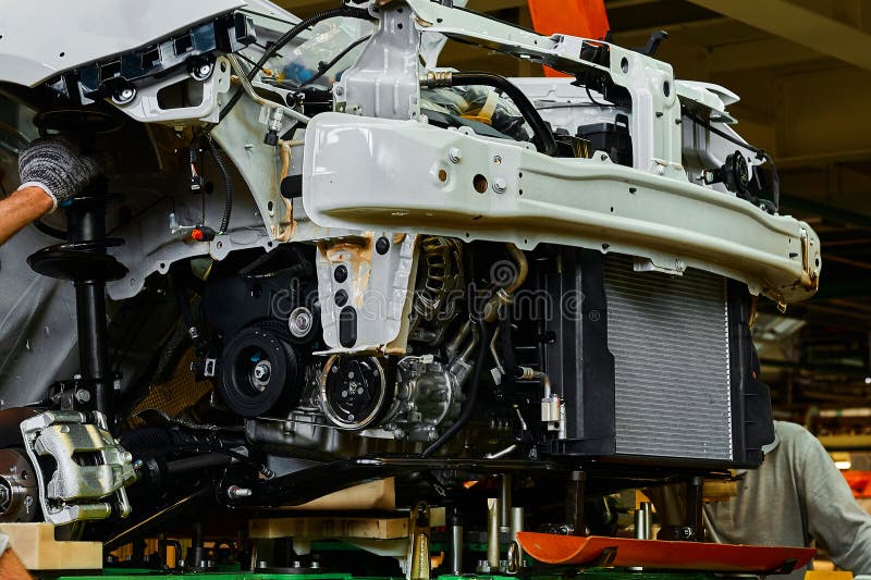 Installing of Motor into Automobile Room in Workshop Stock Image ...