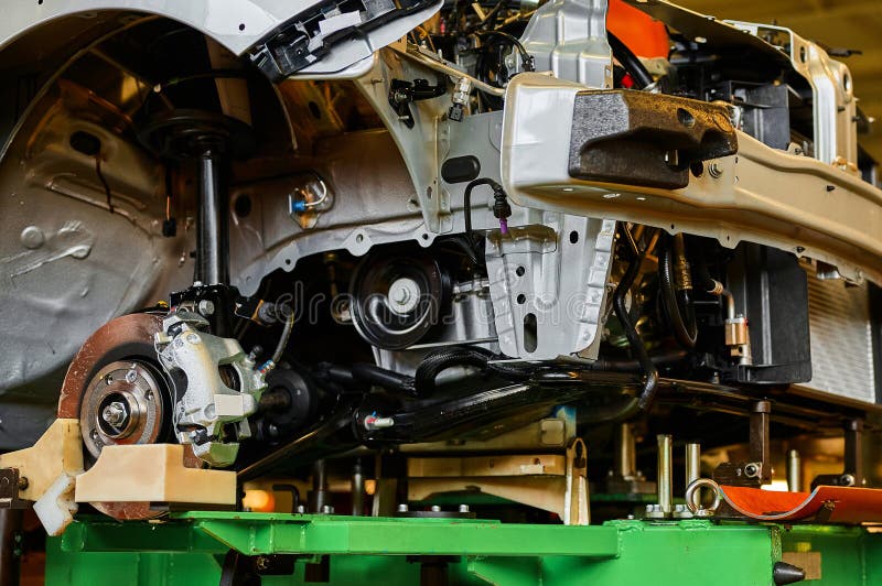 Installing of Motor into Automobile Room in Workshop Stock Image ...