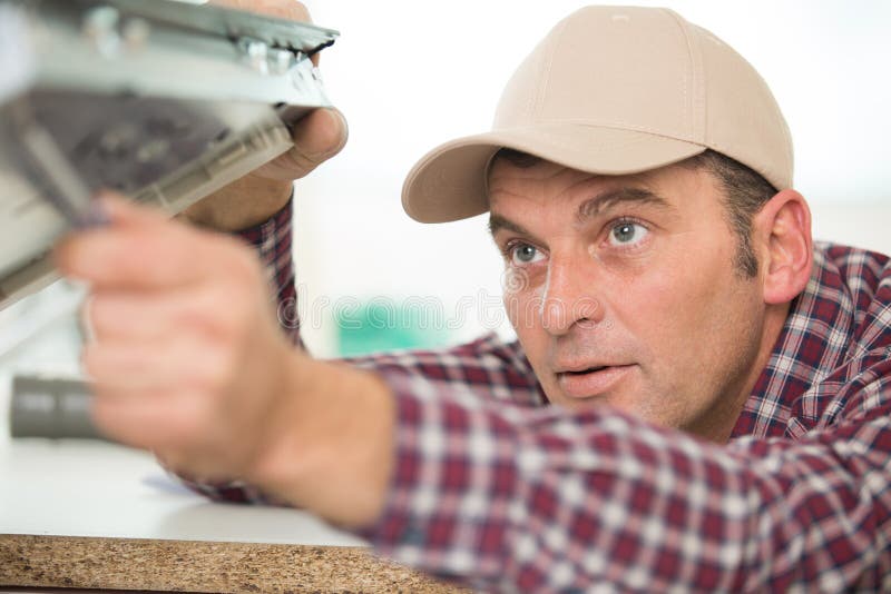 Installing New Hob in Modern Kitchen Stock Image - Image of indoor ...