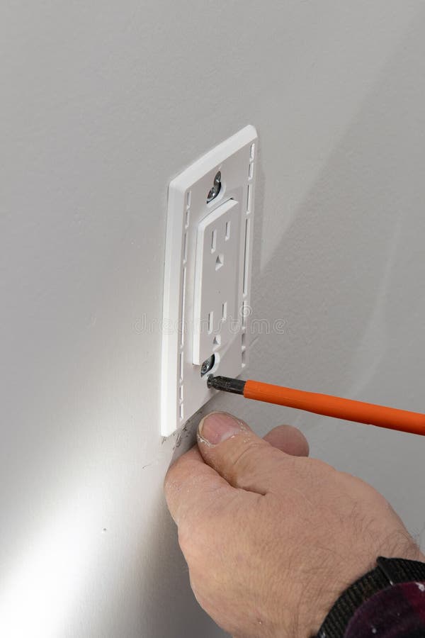 Installing a new socket stock image. Image of hand, electricity - 329792155