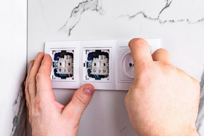 Installing Outlet on White Tile Wall. Stock Photo - Image of socket ...