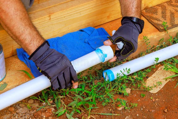 Installing Plastic PVC Pipes for Construction of Water System by a ...