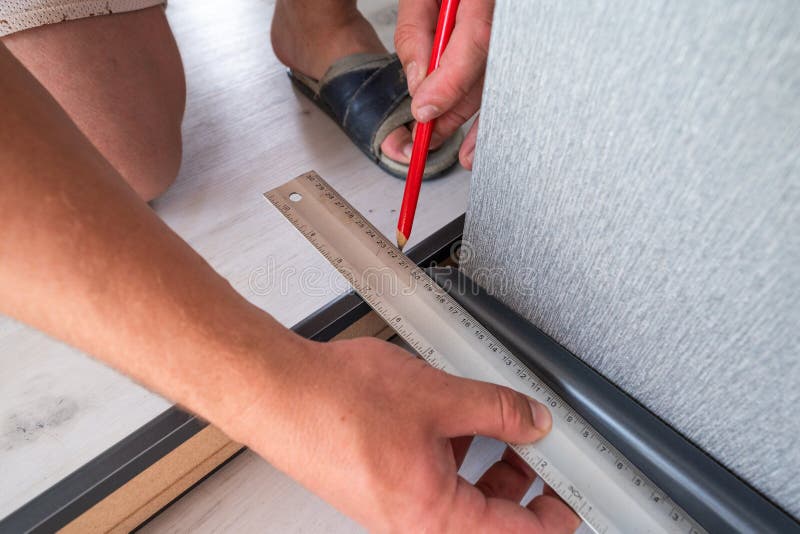 Installing a Plinth in the Room, Measuring the Required Length Using a ...