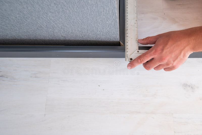 Installing a Plinth in the Room, Measuring the Required Length Using a ...