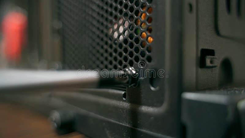 Installing the Power Supply in the System Unit of the Computer. Stock ...