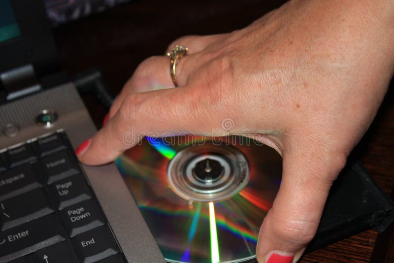 Installing Program from DVD To Laptop Computer - Image Stock Photo ...