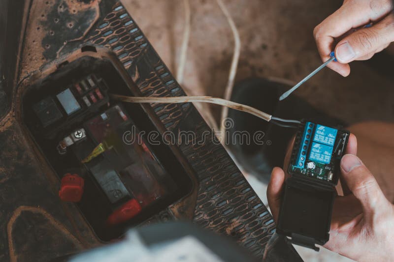 Installing a Relay for a Motorcycle Remote Lock and Starte Stock Image ...