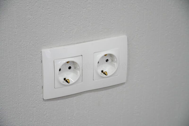 Installing and Replacing an Electrical Outlet in a House during ...