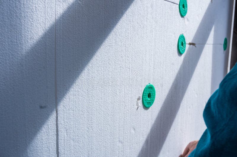 Installing Rigid Styrofoam Insulation Board for Energy Saving of the ...