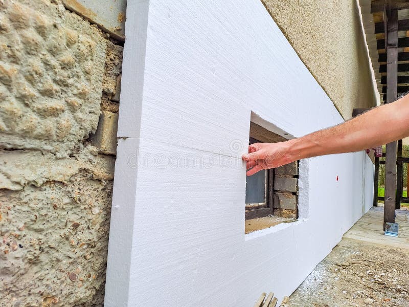 Installing Rigid Styrofoam Insulation Board for Energy Saving of the ...