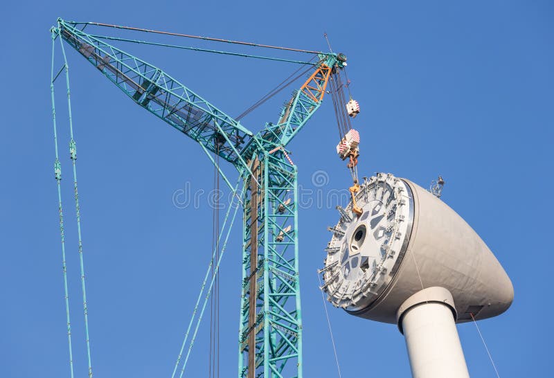 Installing Rotor House at the Top of a New Dutch Wind Turbine Stock ...
