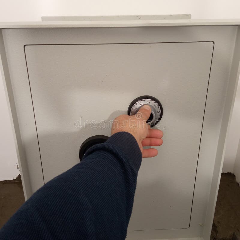 Installing a Safe in the House, the Master Makes Measurements To ...