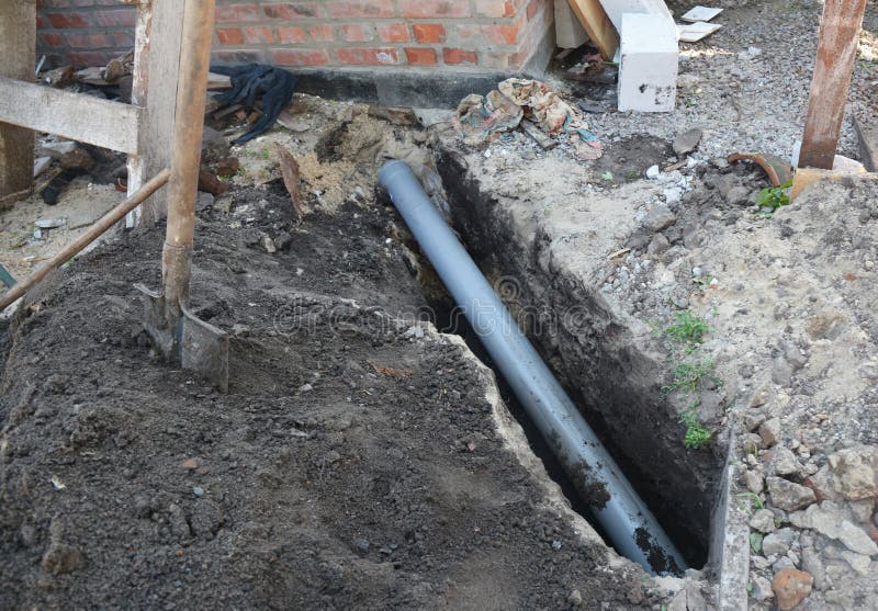 Installing Sewer Pipe in the Ground Trench Stock Image - Image of ...