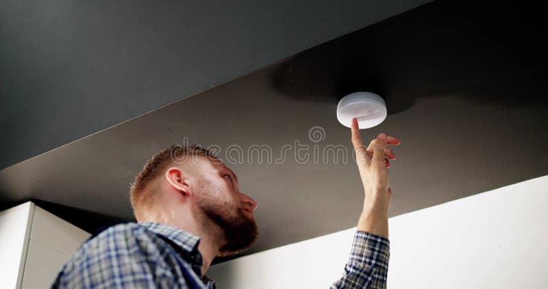 Installing Smoke Detector on Ceiling Stock Photo - Image of detector ...