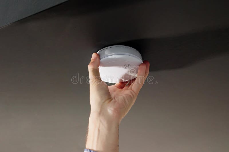 Installing Smoke Detector on Ceiling Stock Photo - Image of emergency ...
