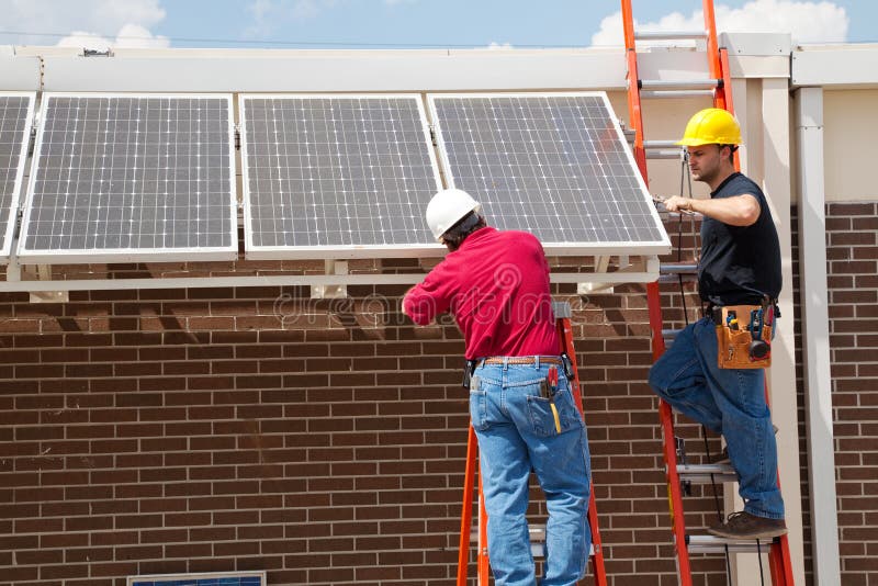 Installing Solar Panels stock image. Image of construction - 8683063