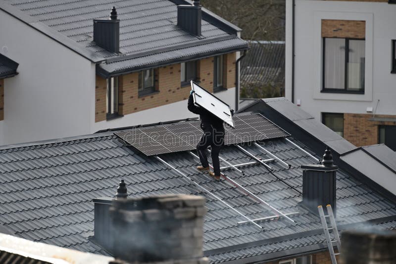 Installing Solar Panels on the Roof Stock Image - Image of electricity ...