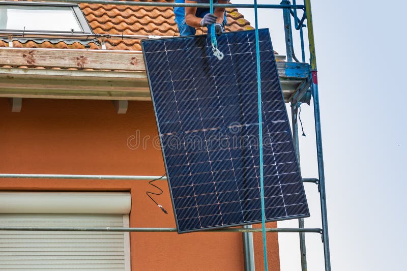 Installing Solar Panels on a Roof. Solar Panels on Roof Stock Image ...