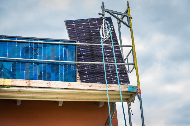 Installing Solar Panels on a Roof. Solar Panels on Roof Stock Photo ...