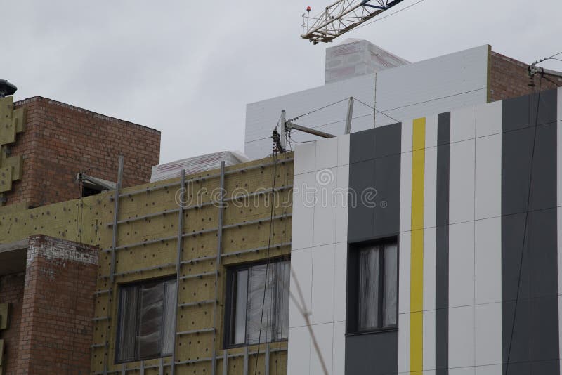 Installing Thermal Insulation on the Wall of a New Building Stock Image ...