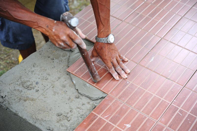 Installing Tiles stock photo. Image of hands, ceramic - 25412358