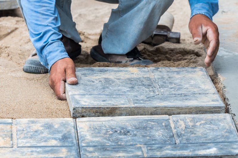 Installing Tiles Floor in Construction Work Stock Image - Image of ...