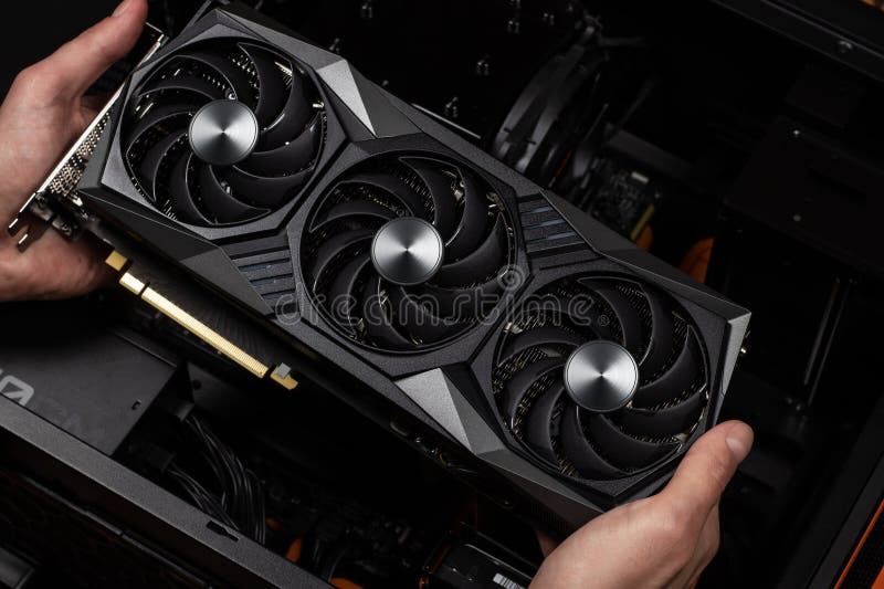 Installing Video Card in an Open Case of Personal Computer. Stock Photo ...