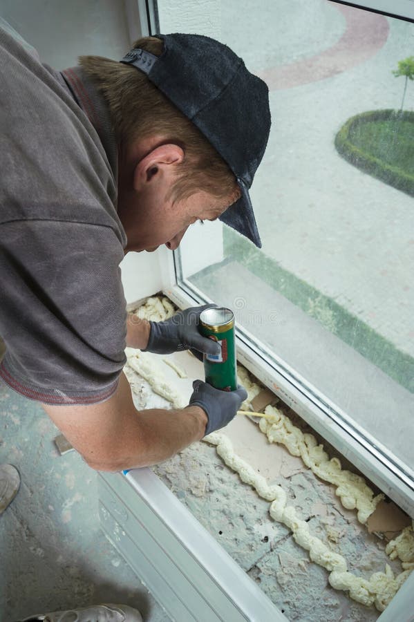 Installing window sill stock image. Image of home, construction - 58586363
