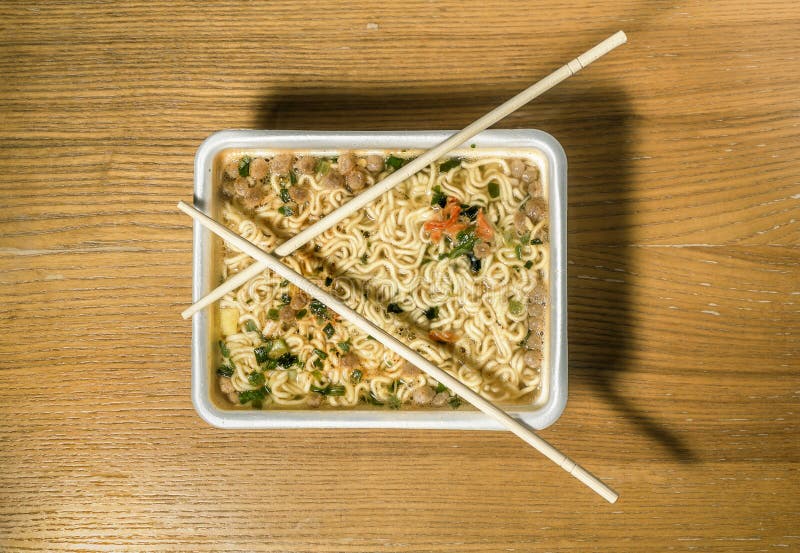 Instant Noodles in a Plastic Container with Wooden Sticks Stock Photo ...