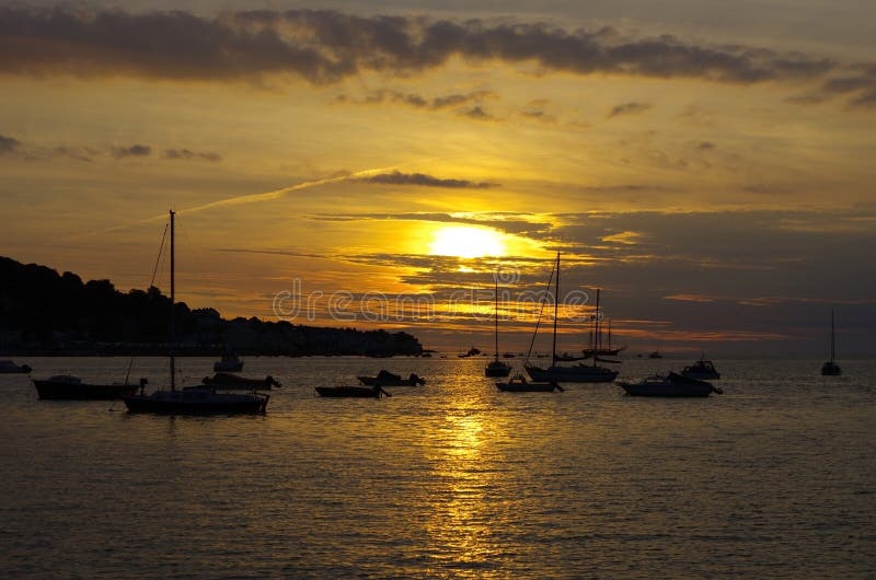 Instow Devon England Sunset,Golden Sunset Over a Bay with Silhouetted ...