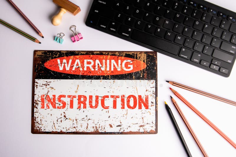 Instruction Concept. Warning Sign with Text and Office Supplies on ...