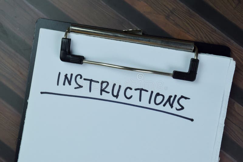 Instructions Write on a Paperwork Isolated on Wooden Table Stock Image ...