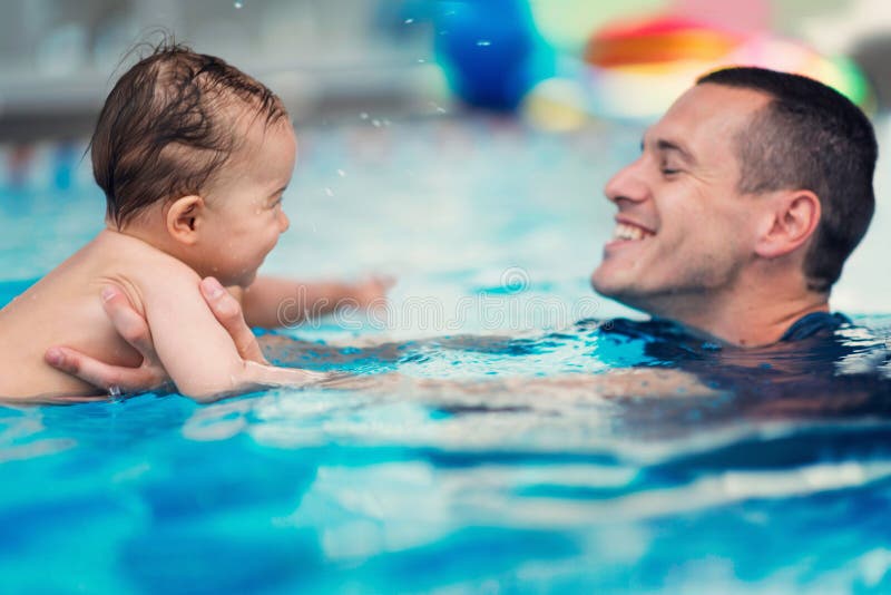 Instructor with Baby Boy on Swimming Class Stock Image - Image of focus ...