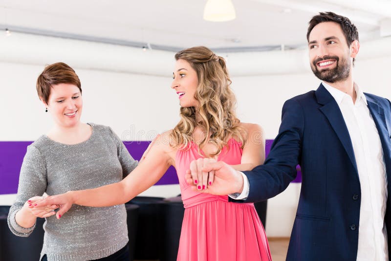 Instructor in Dance School with Couple Stock Photo - Image of activity ...