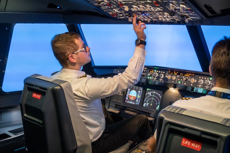 Instructor in the Flight Simulator Cabin during Training Editorial ...