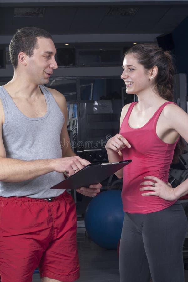 Instructor in gym stock photo. Image of fitness, people - 30779782