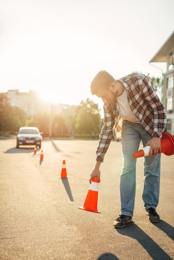 Instructor Sets the Cone, Driving School Concept Stock Image - Image of ...