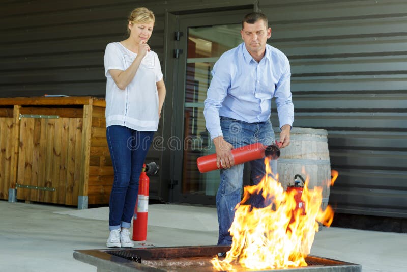 Instructor Shows How To Use Fire Extinguisher Stock Image - Image of ...
