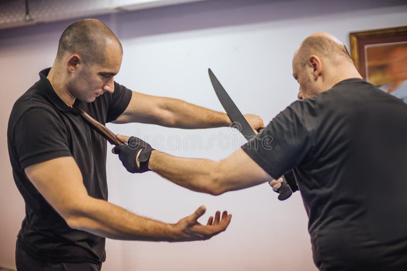 Instructor and Student Practice Long Sword and Knife Fighting Technique ...