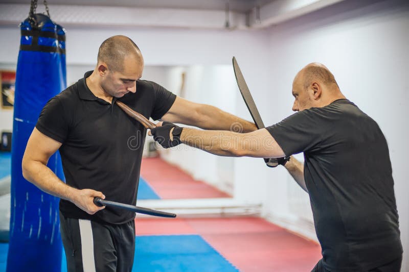 Instructor and Student Practice Long Sword and Knife Fighting Technique ...