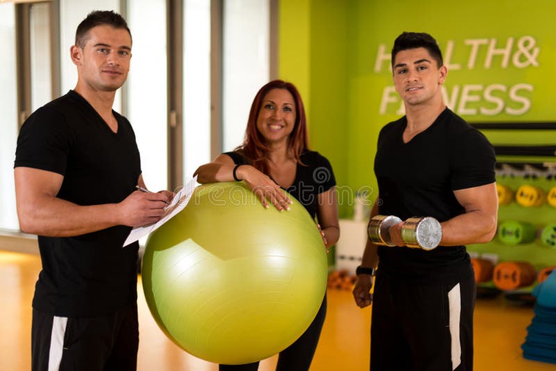 Instructor Taking Exercise Class Stock Image - Image of 2025, indoors ...