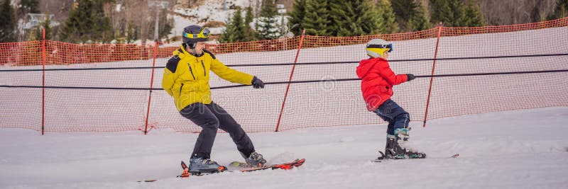 Ski Instructor at Training Track Showing Students How To Ski BANNER ...