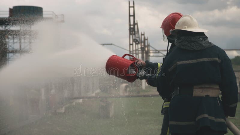 Instructor Teaching Fireman To Extinguish Fire Stock Footage - Video of ...