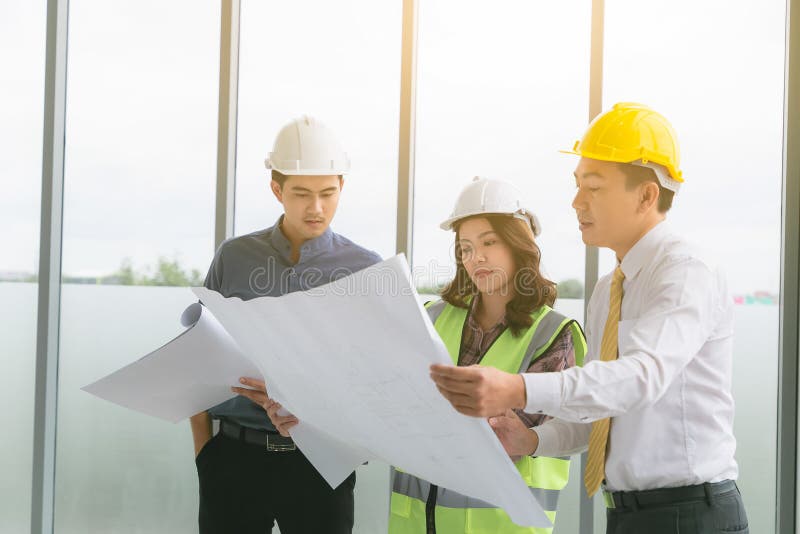Instructor with Young People in Engineering Training in Construction on ...