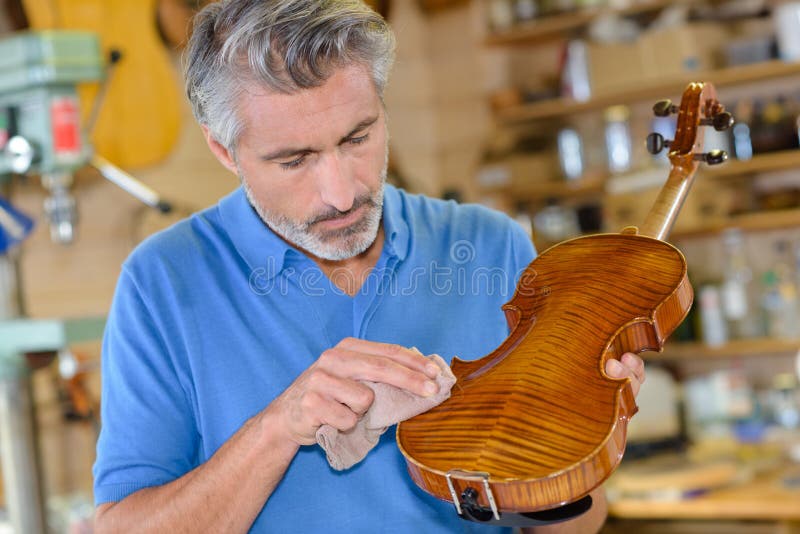 Instrument Maker Polishing Violin Stock Photo - Image of senior, wood ...