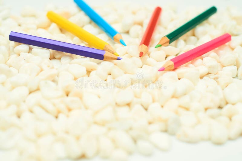 Drawing. Colored Pencils on White Stones, Inspired Stock Image - Image ...