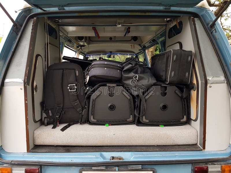 The Instruments in the Cases are Loaded into the Van. Stock Image ...