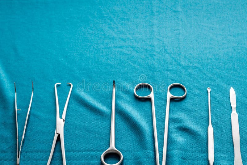 Instruments for Plastic Surgery on Blue Background Flat Lay Stock Photo ...