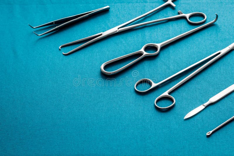 Instruments for Plastic Surgery on Blue Background Flat Lay Stock Photo ...