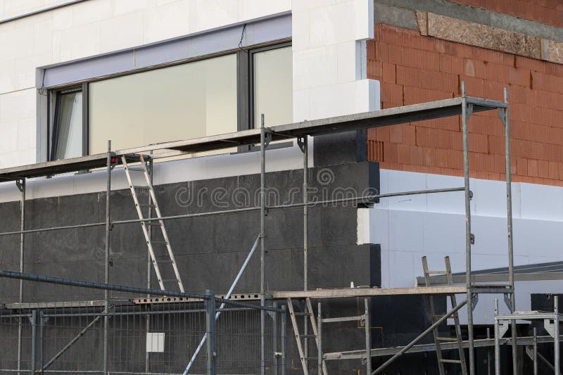 Insulating the Walls with Modern Thermal Insulation Materials. the New ...